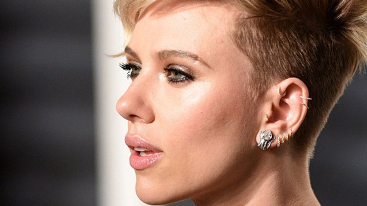 Celebrities and Ear Curation: How Multiple Ear Piercings Became a Must ...